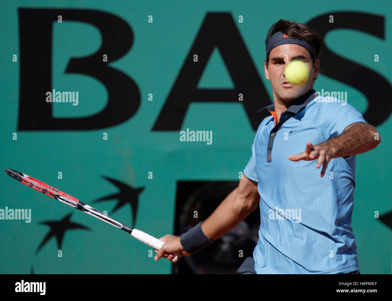 Roger federer action photos hi-res stock photography and images - Alamy