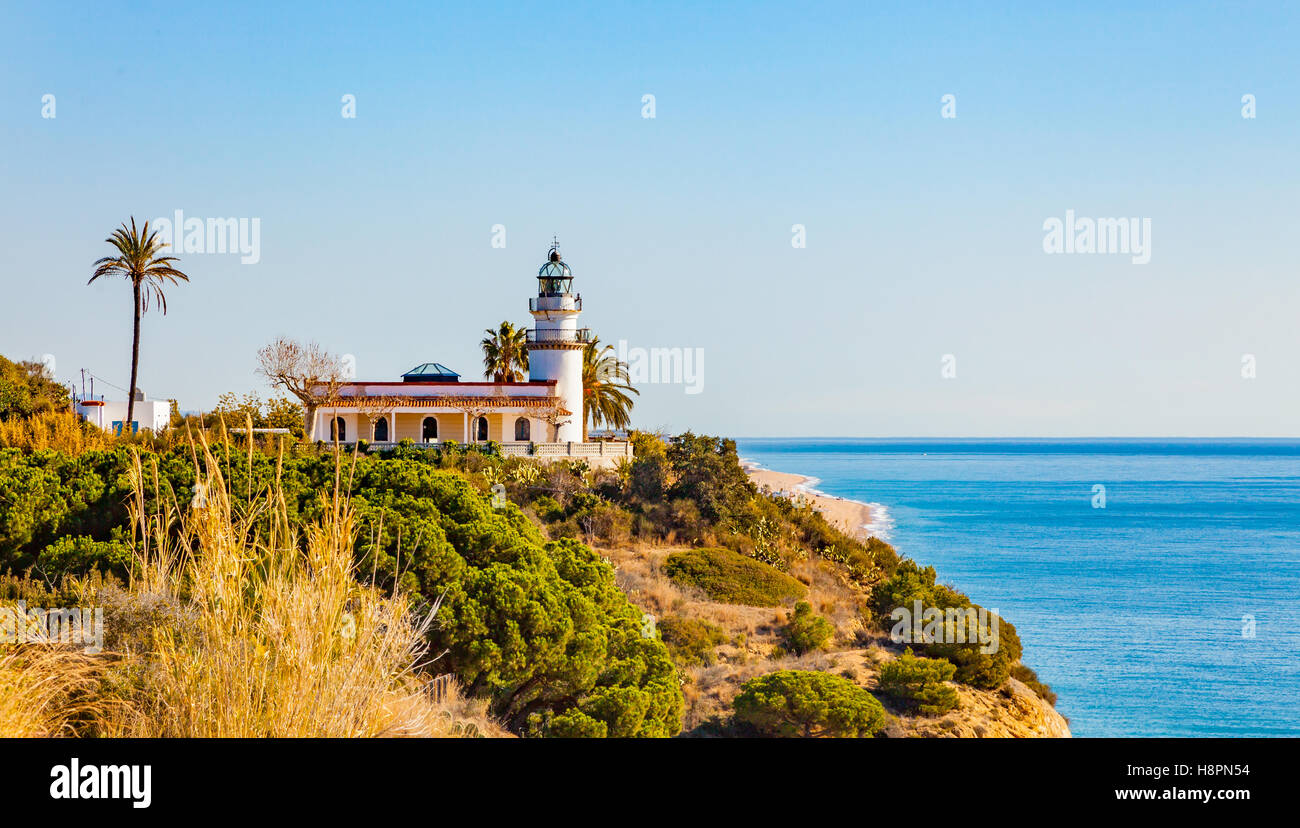 The famous lighthouse near Calella, Spain, overlooking the blue ...