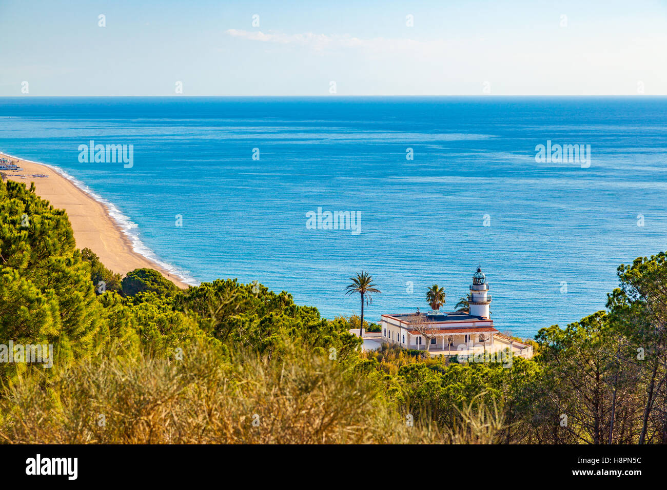 The famous lighthouse near Calella, Spain, overlooking the blue ...