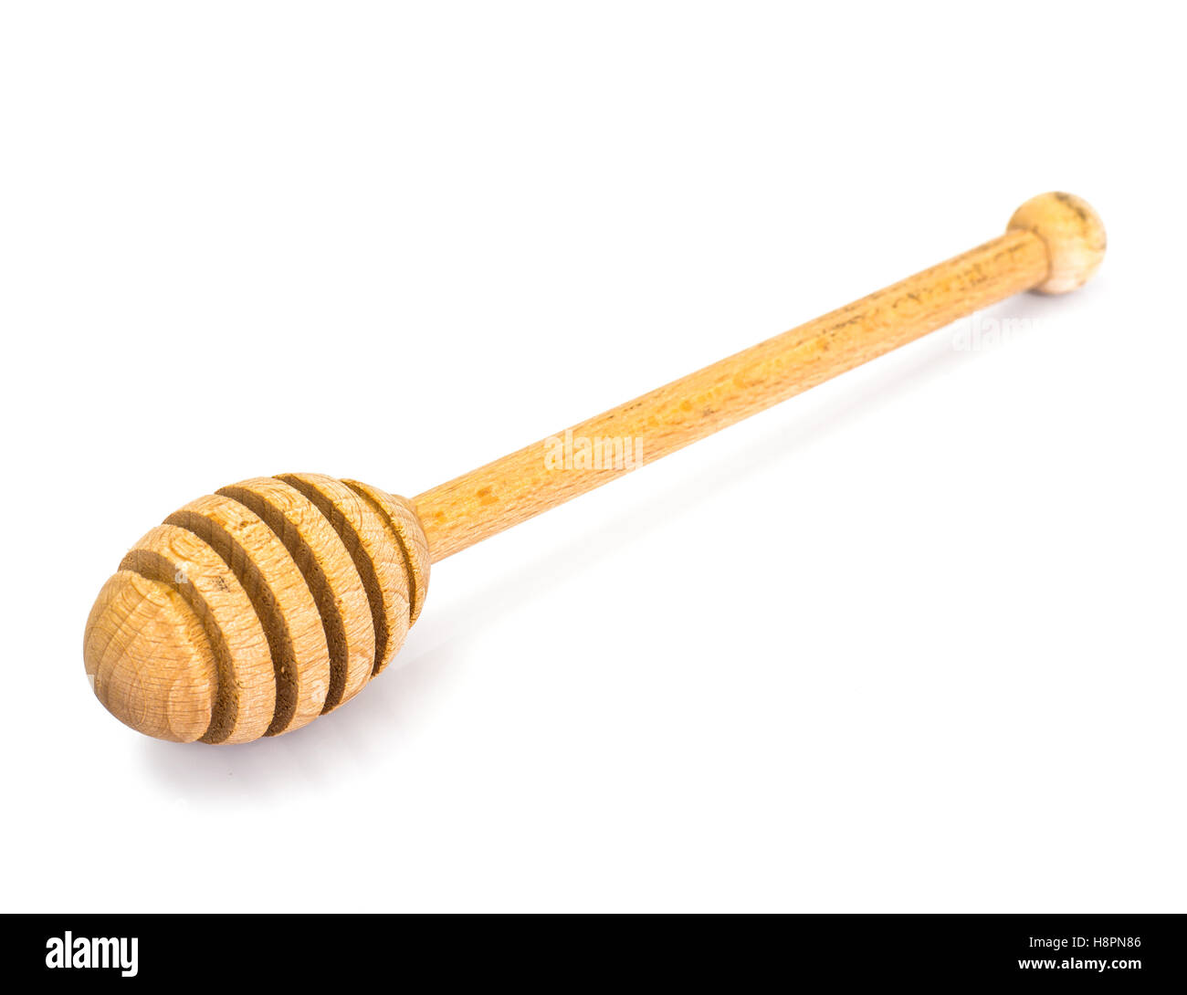 Honey dipper on White Background Stock Photo - Alamy