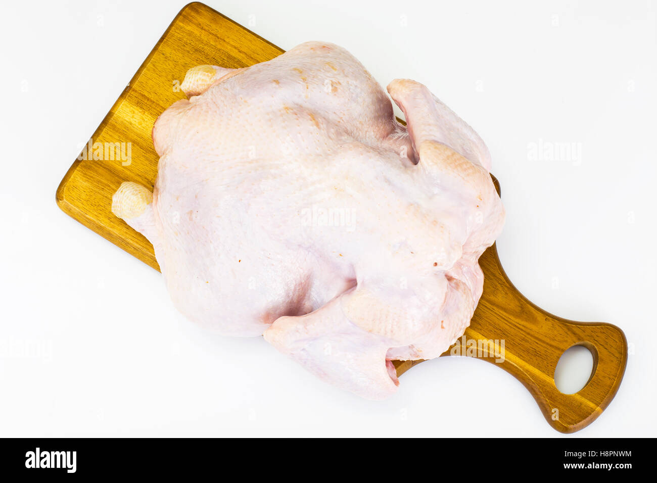 The Split Carcass of Raw Chicken. Isolated on White Stock Photo - Alamy