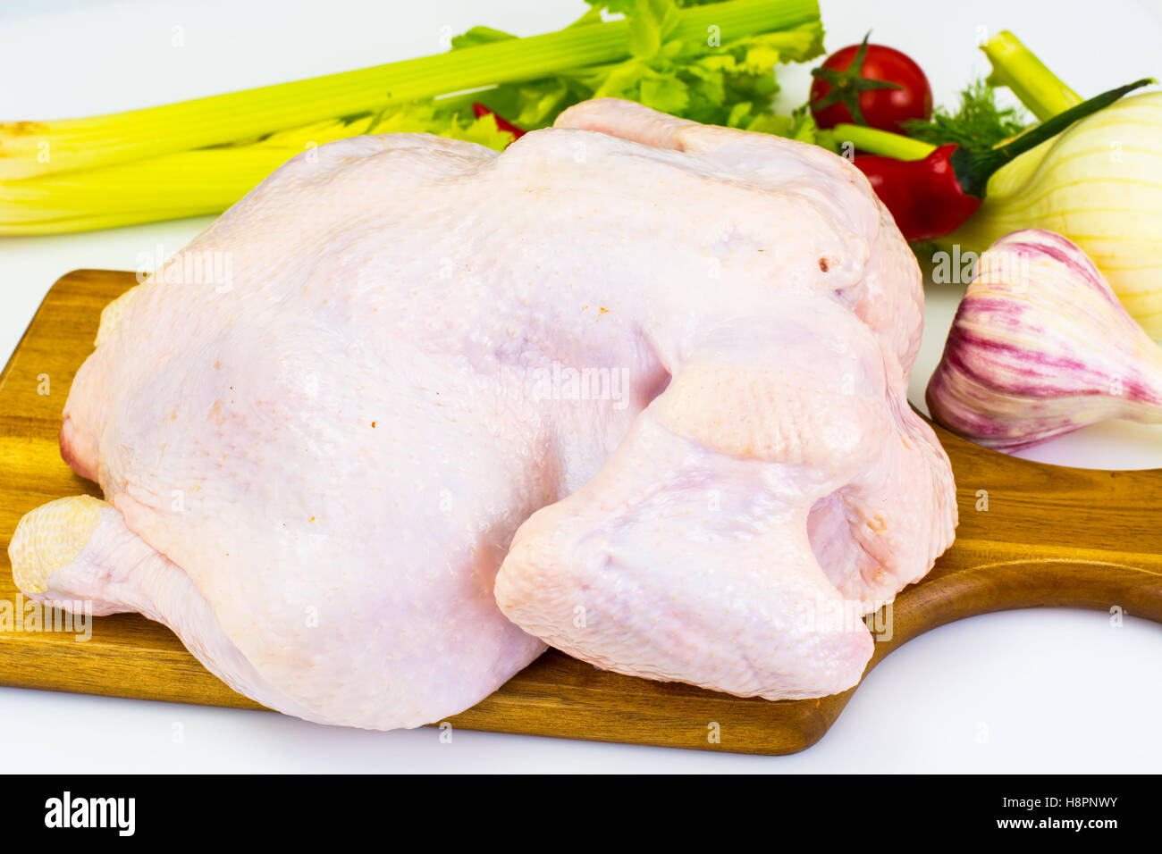 The Split Carcass of Raw Chicken. Isolated on White Stock Photo - Alamy