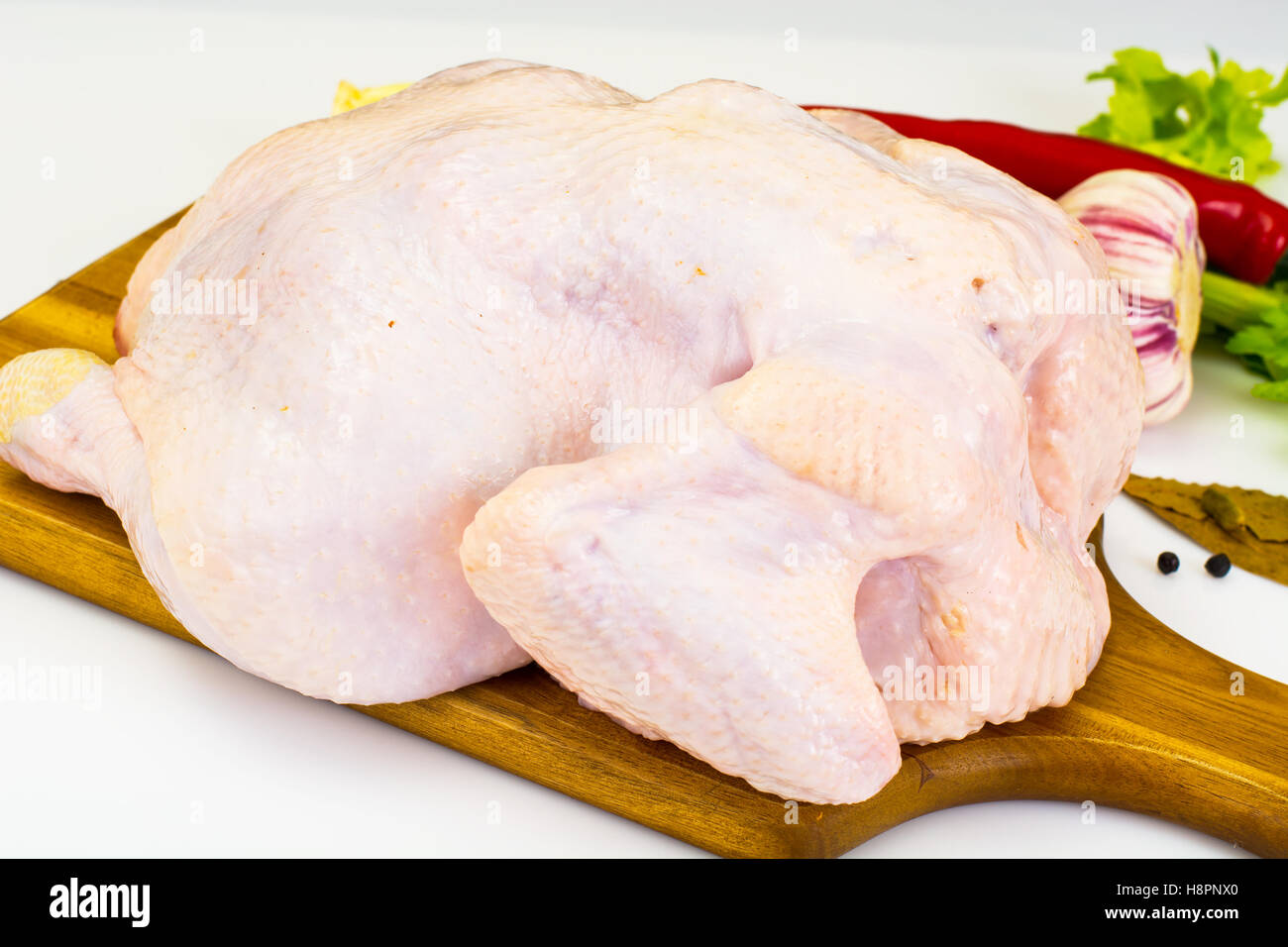 The Split Carcass of Raw Chicken. Isolated on White Stock Photo - Alamy