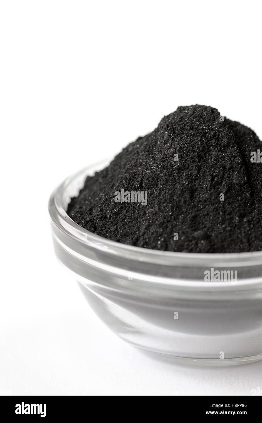 Activated charcoal powder shot with a macro lens Stock Photo - Alamy