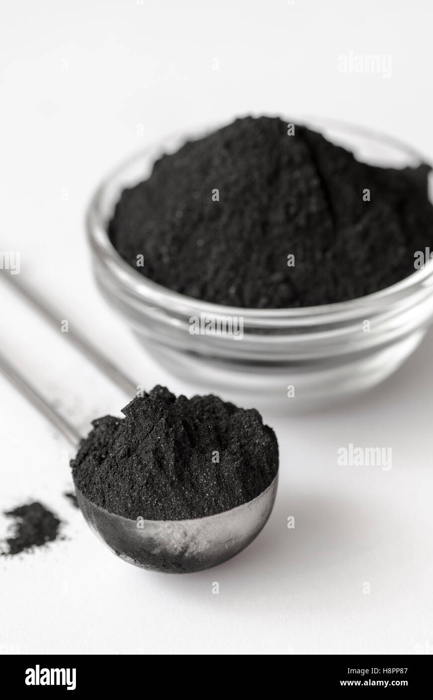 Activated charcoal powder shot with a macro lens Stock Photo - Alamy