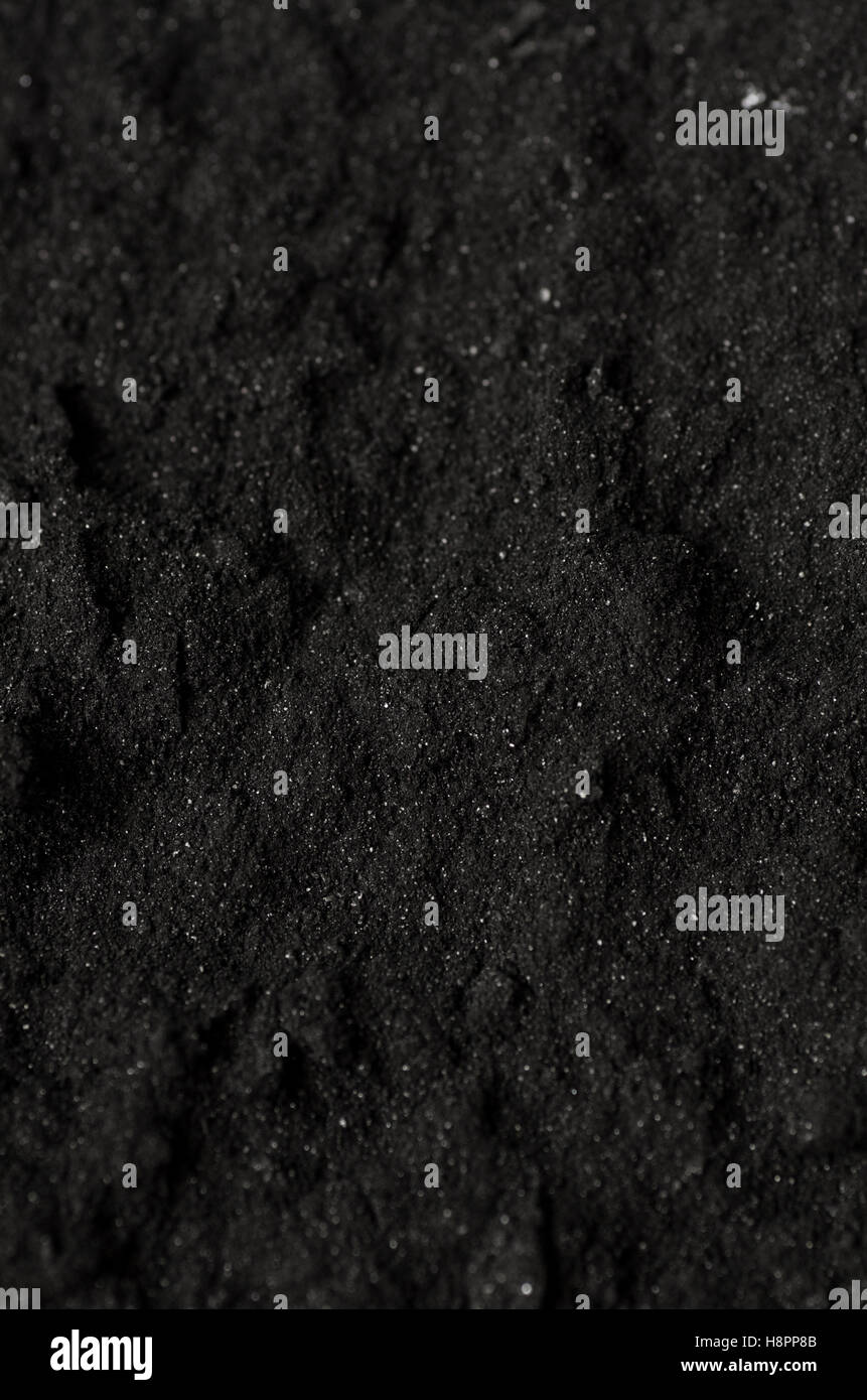 Activated charcoal powder shot with a macro lens Stock Photo - Alamy