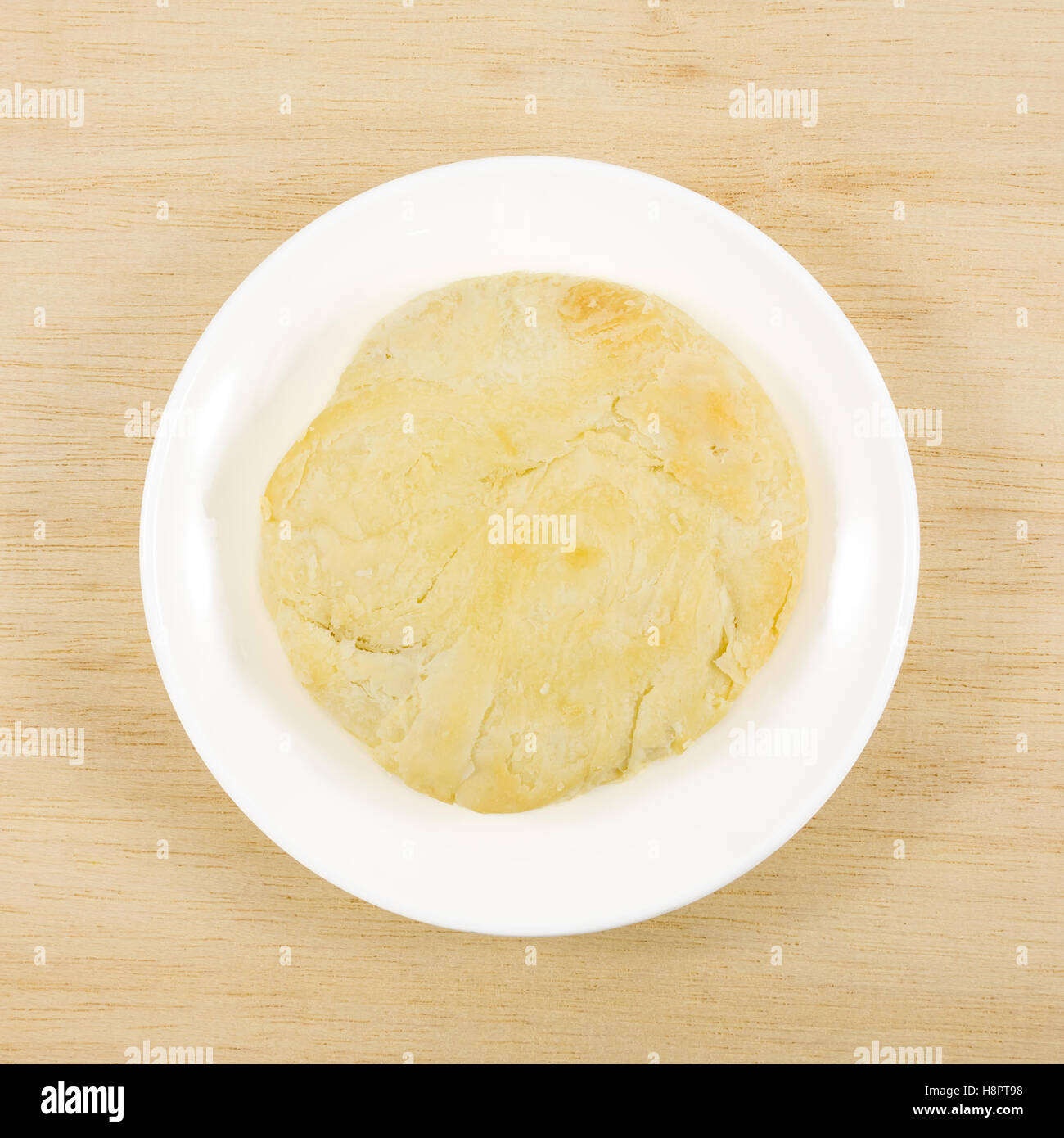 The Taiwanese sun cake (milk butter pastry) on the small white dish ...