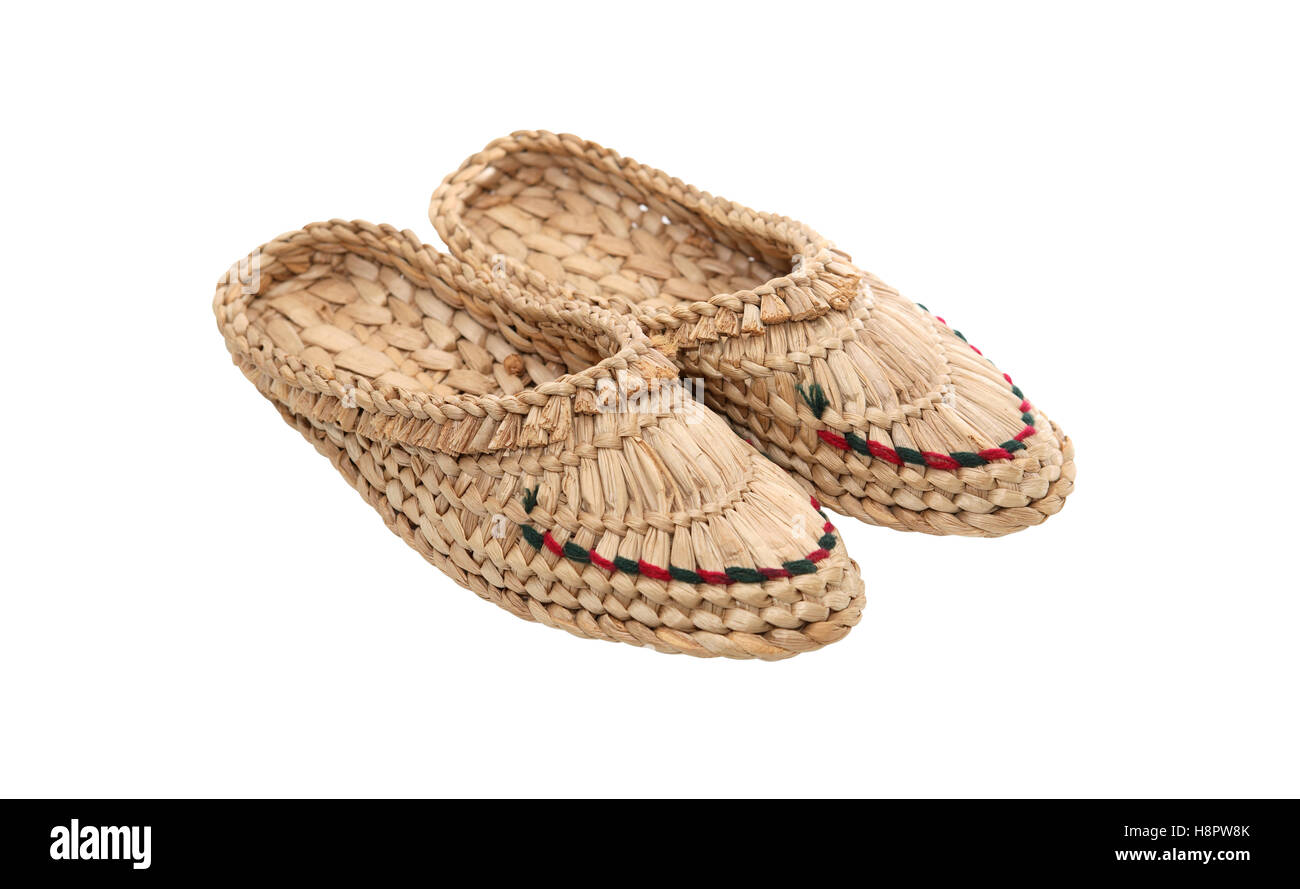 Wicker home shoes isolated on white background with clipping path Stock ...