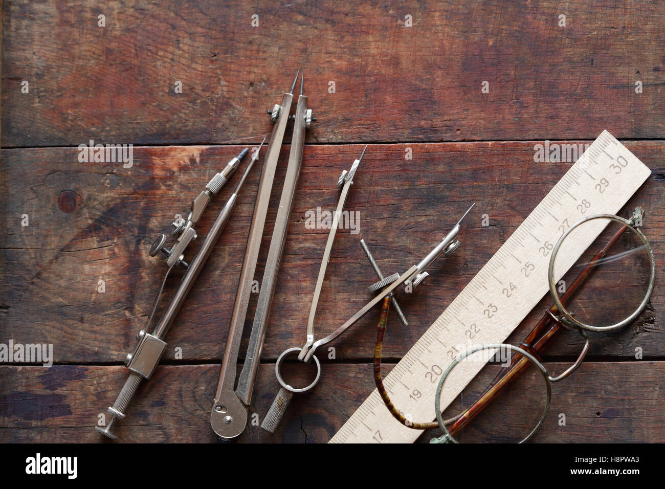 Set of vintage drawing instrument on old wooden background Stock Photo ...