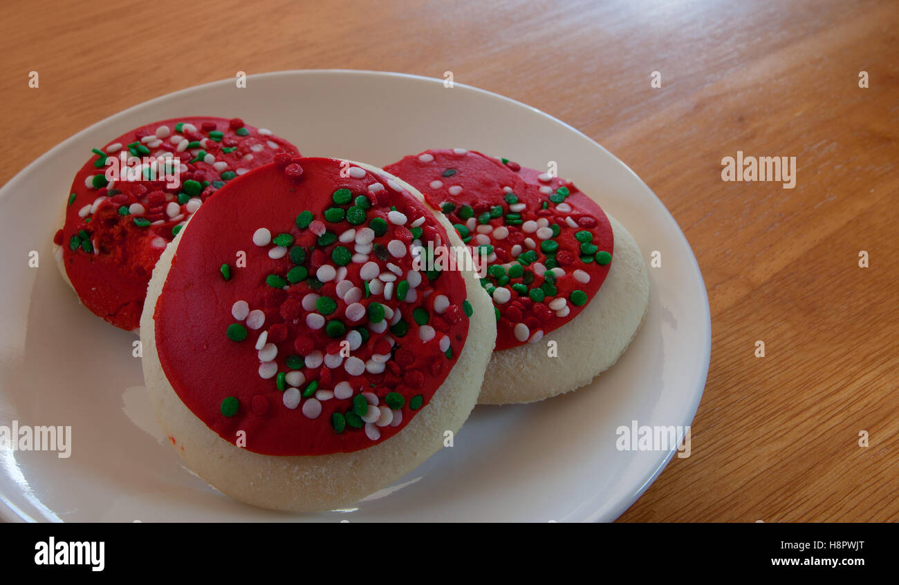 Big cookies with red frosting and green and white sprinkles Stock Photo ...