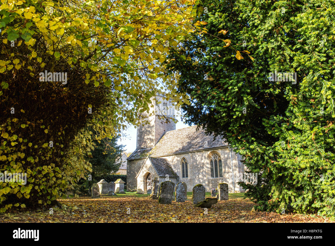 St Andrews Church in autumn, Coln Rogers, Cotswolds, Gloucestershire ...