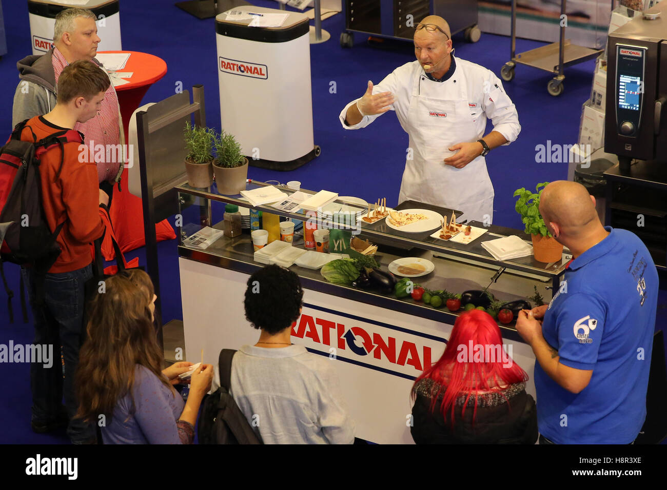 Rostock, Germany. 15th Nov, 2016. Visitors watch a "Self Cooking ...