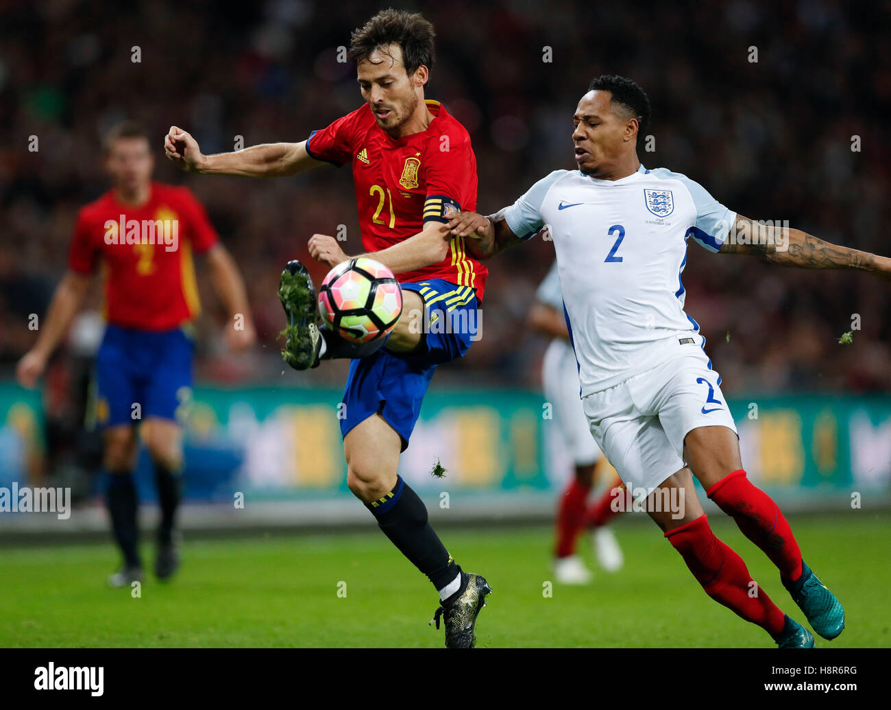 London, UK. 15th Nov, 2016. Nathaniel Clyne (R) of England vies with ...