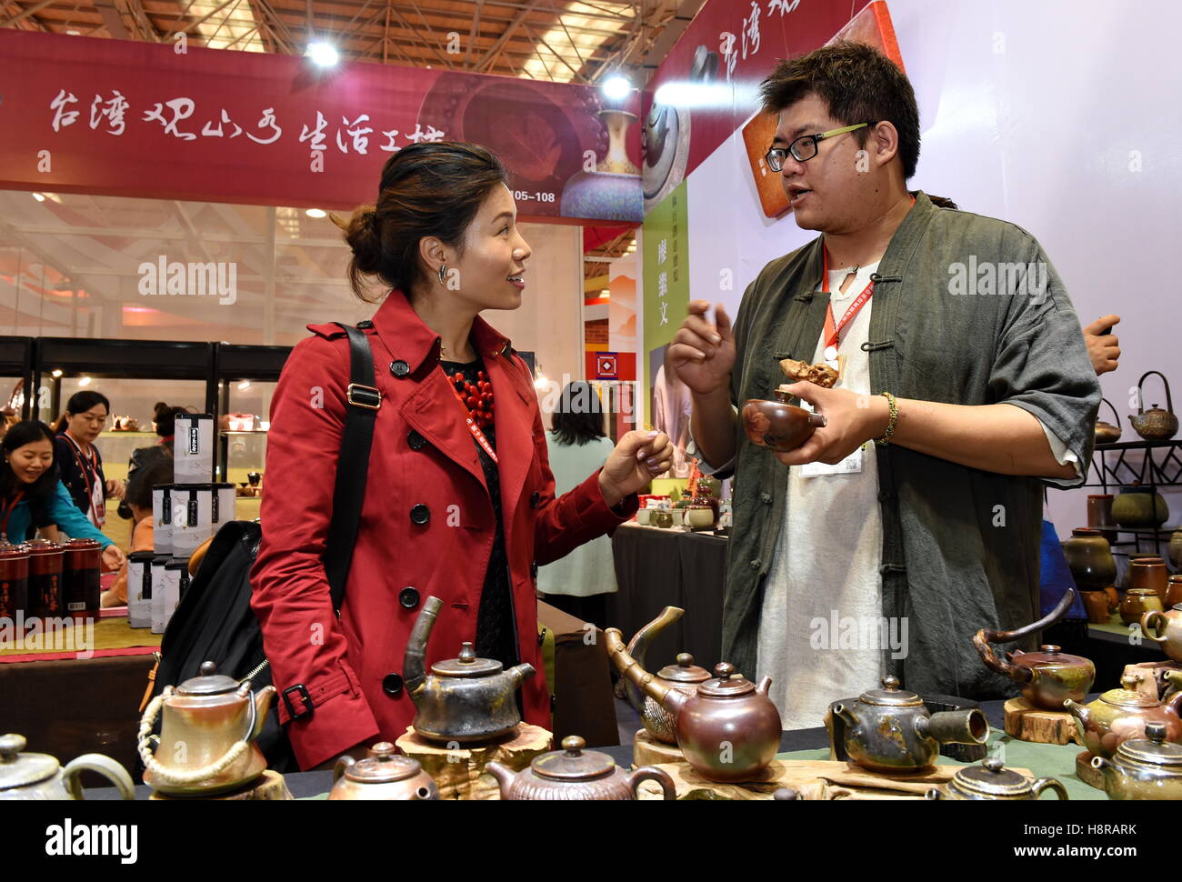 Wuyishan, China's Fujian Province. 16th Nov, 2016. A merchant (R) from ...