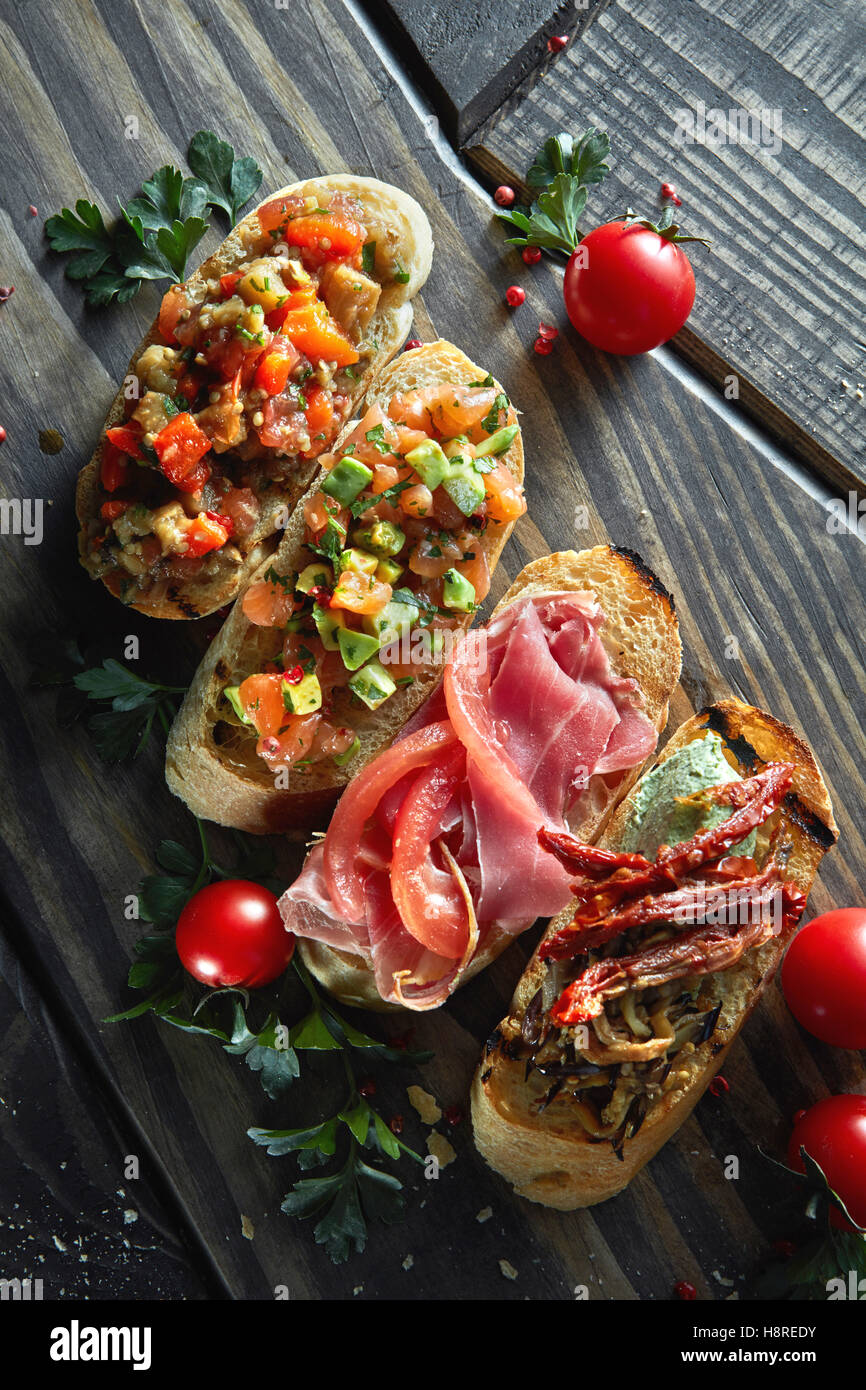 Delicious Canapes.Assorted Italian appetizer bruschetta with chopped ...