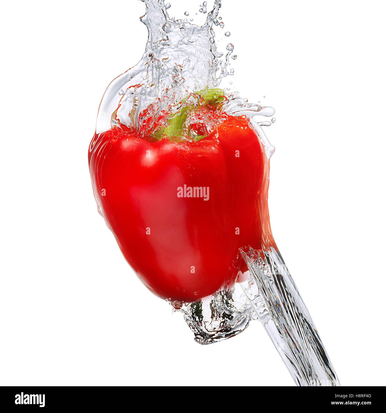 Water splash with bell pepper isolated Stock Photo - Alamy