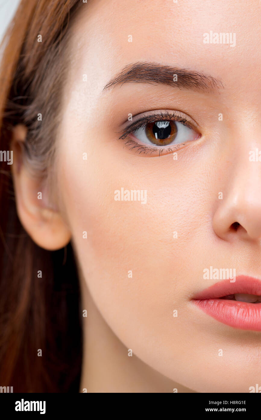 The face of woman on gray background Stock Photo - Alamy