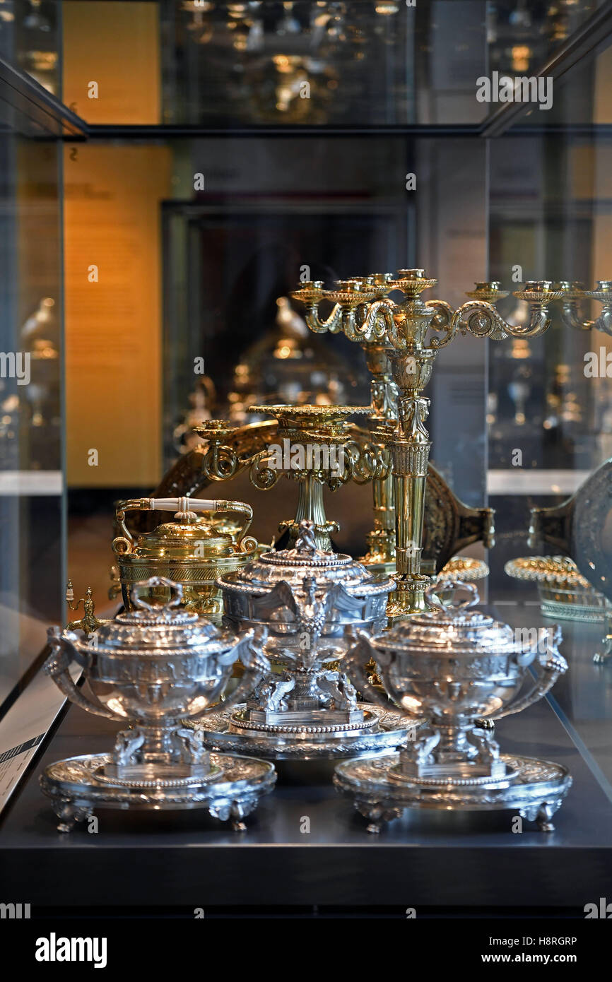 Gold and silver tableware of a Regency style exhibited inside the ...