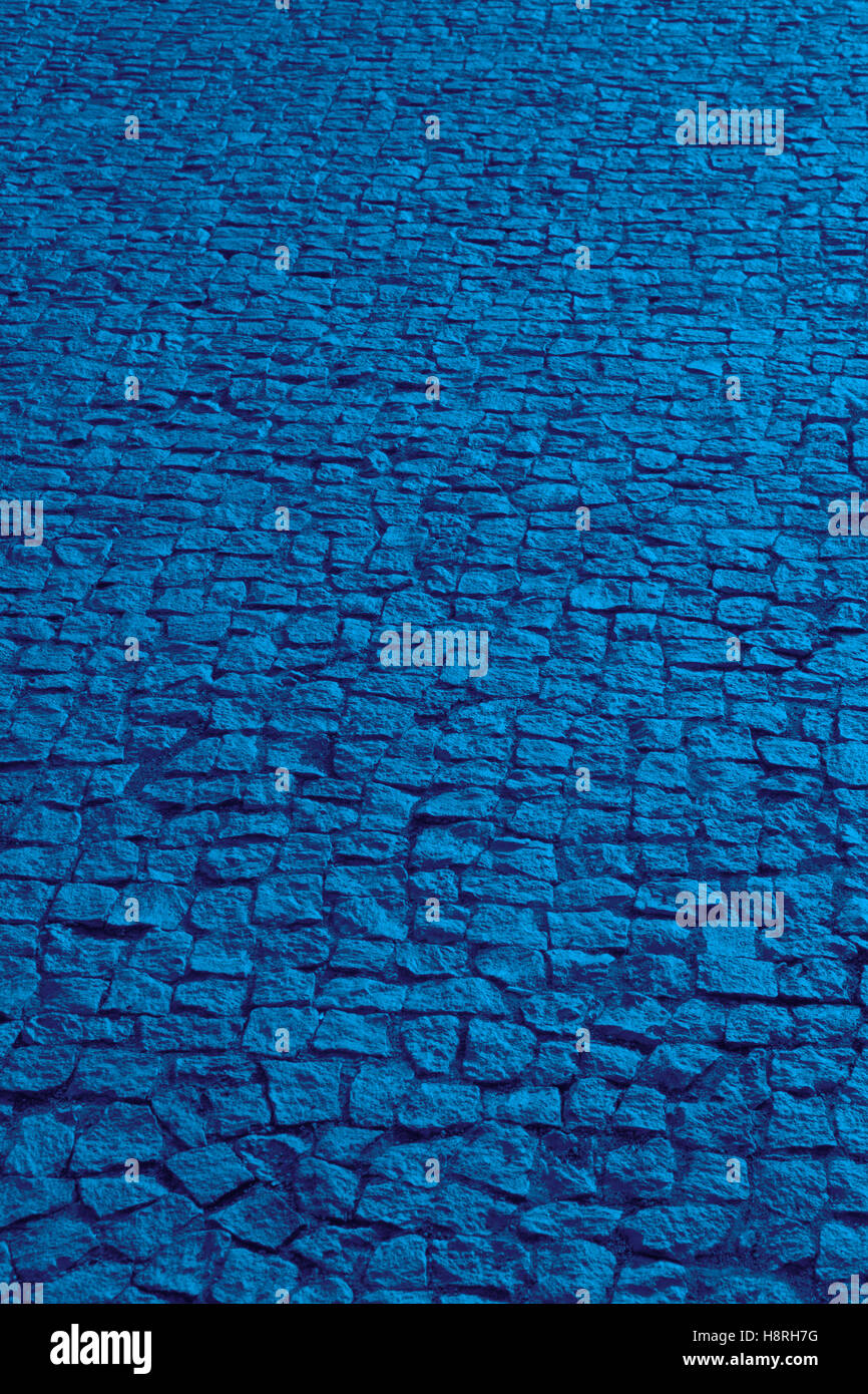 Traditional cobblestone floor street in blue tone. Vertical Stock Photo ...