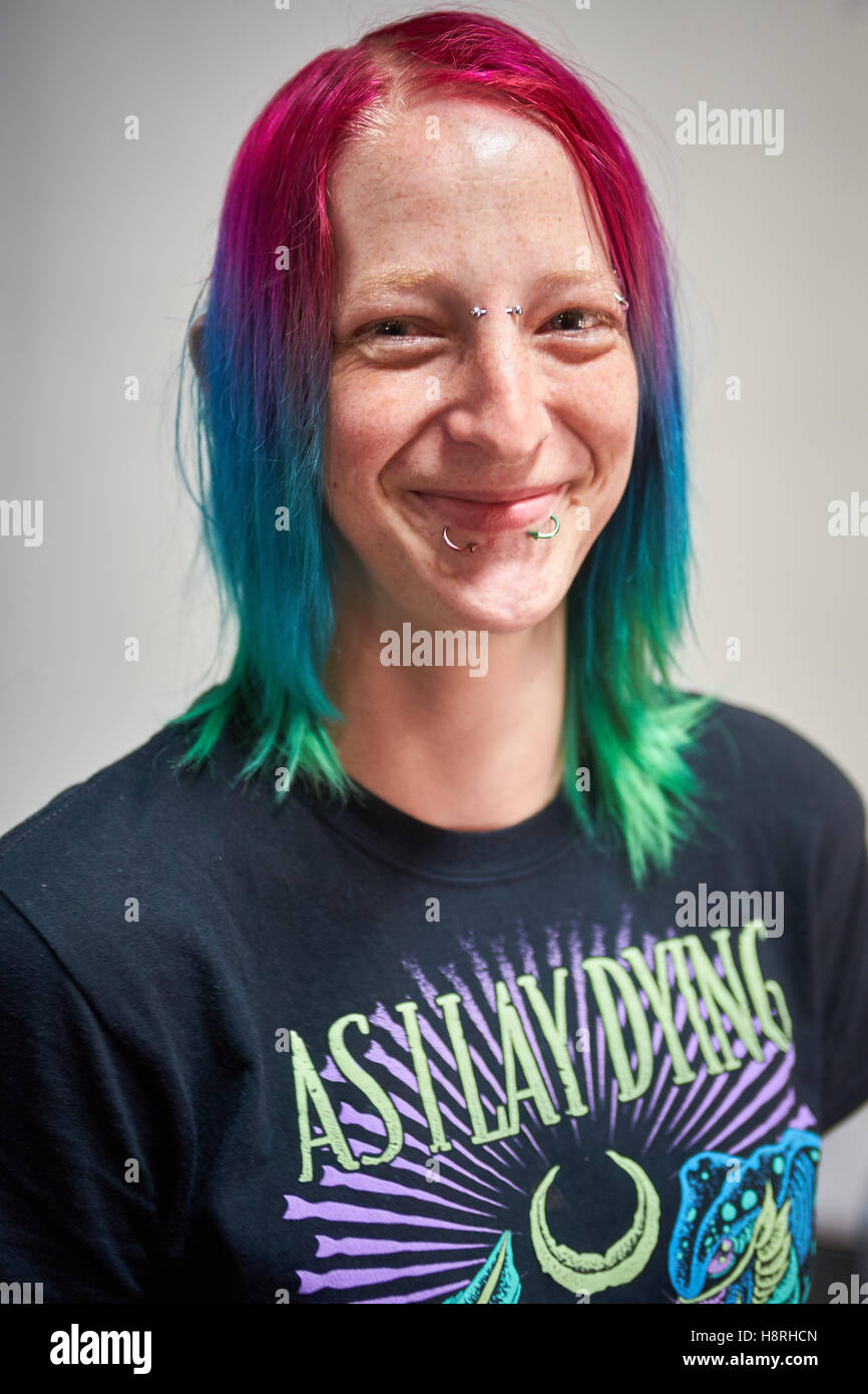 A woman before being suspended by 10 body hooks by the State of Bliss ...