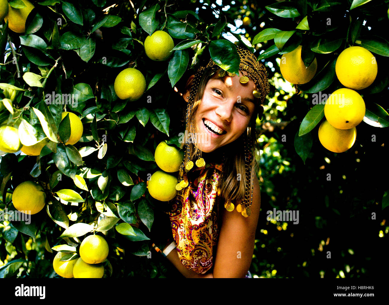 pretty islam woman in orange grove smiling, real muslim girl che Stock ...