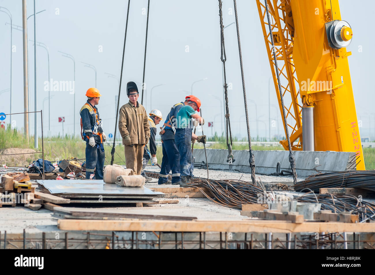 Workers on bridge construction Stock Photo - Alamy