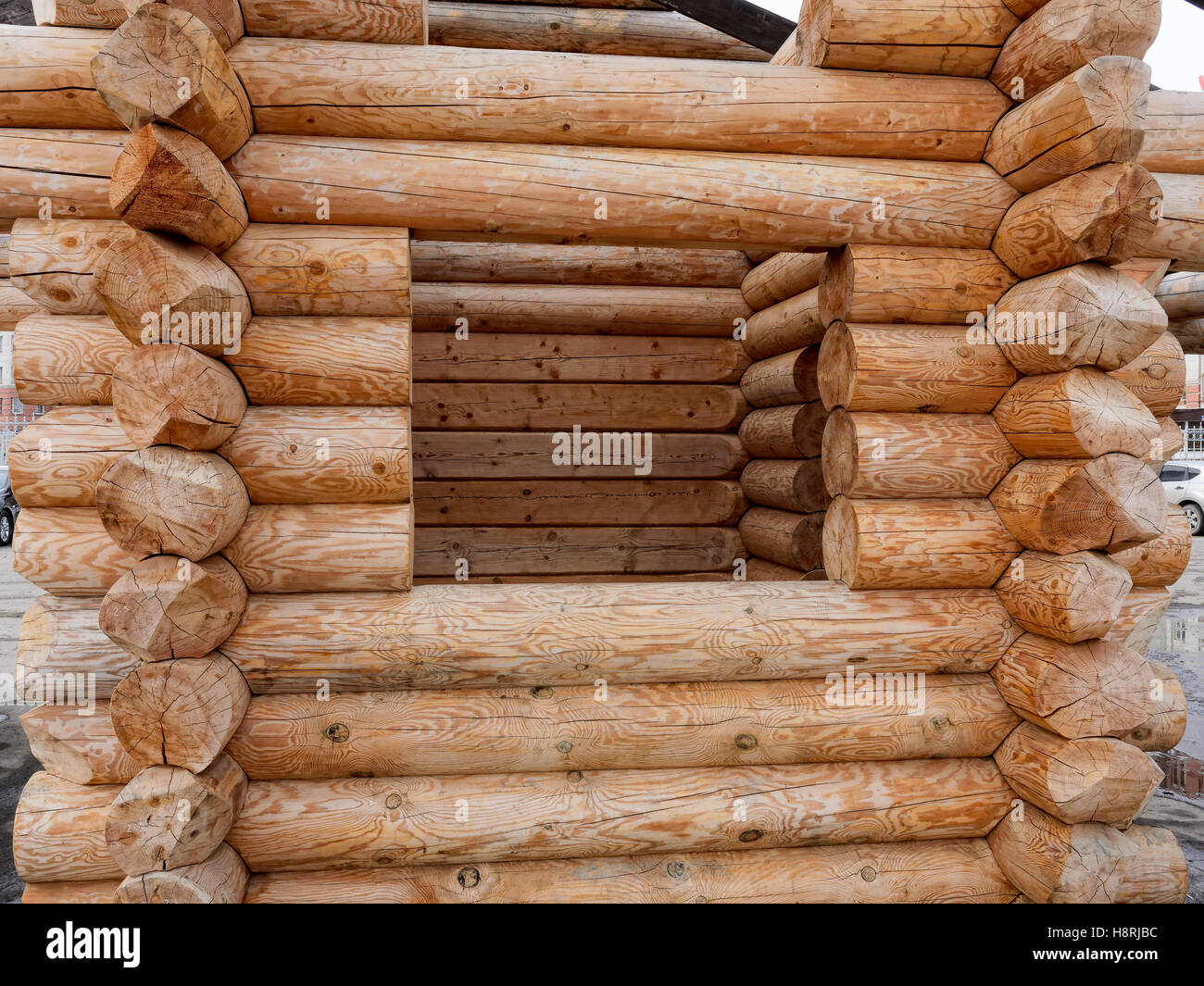 Wooden wall cut of house with window Stock Photo - Alamy