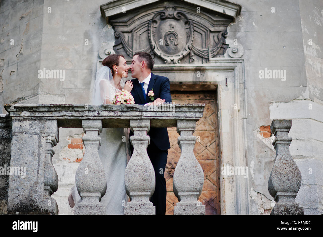Wedding couple background old vintage castle. Happy newlyweds at their ...