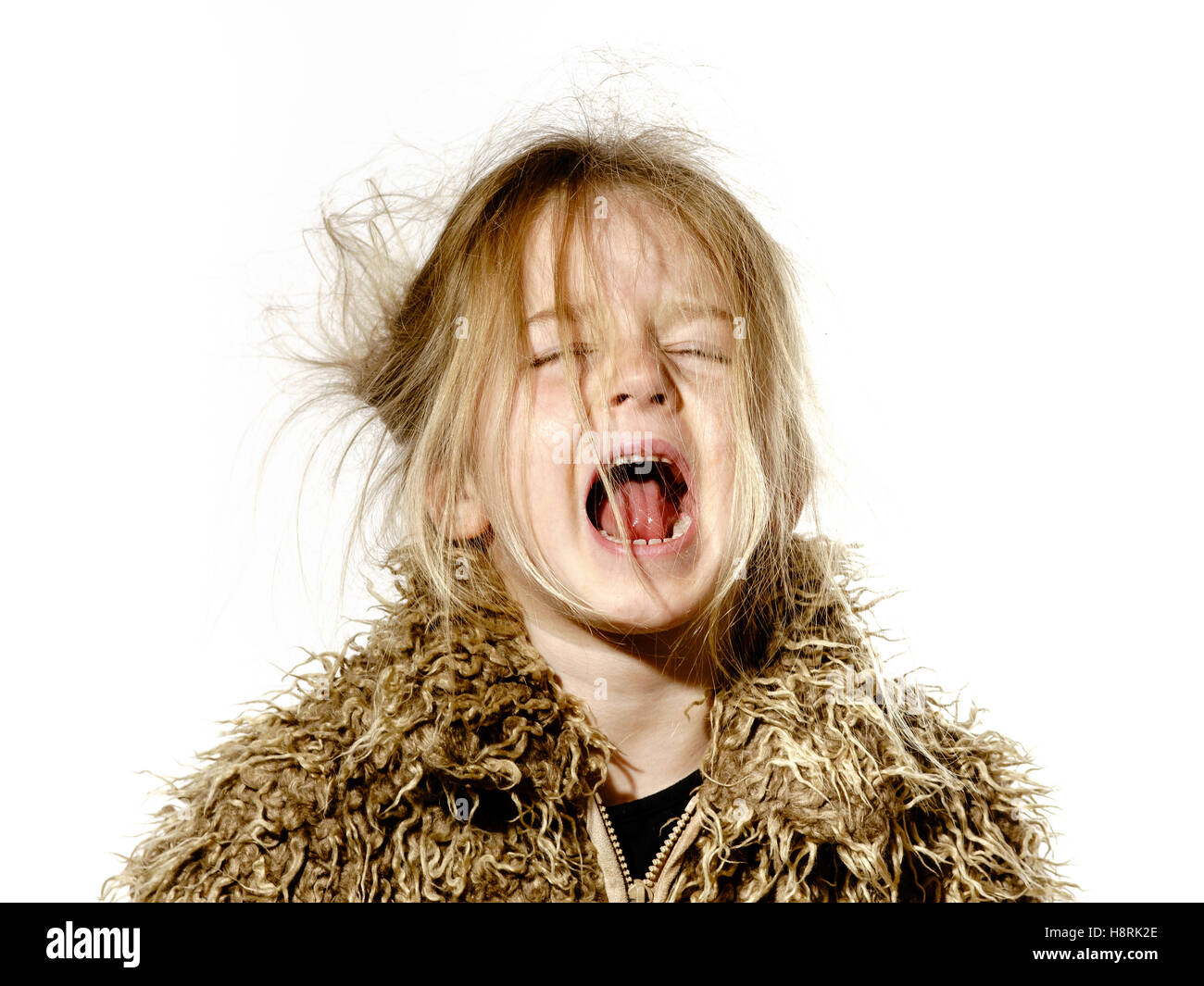 Disheveled preschooler girl with long hair crying, isolated on white ...