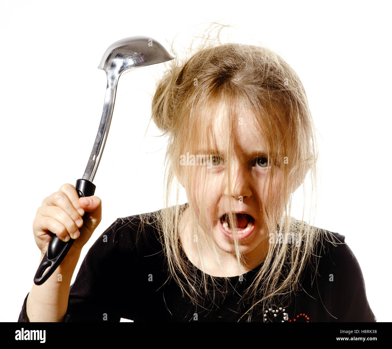 Disheveled preschooler girl with soup ladle, isolated on white ...