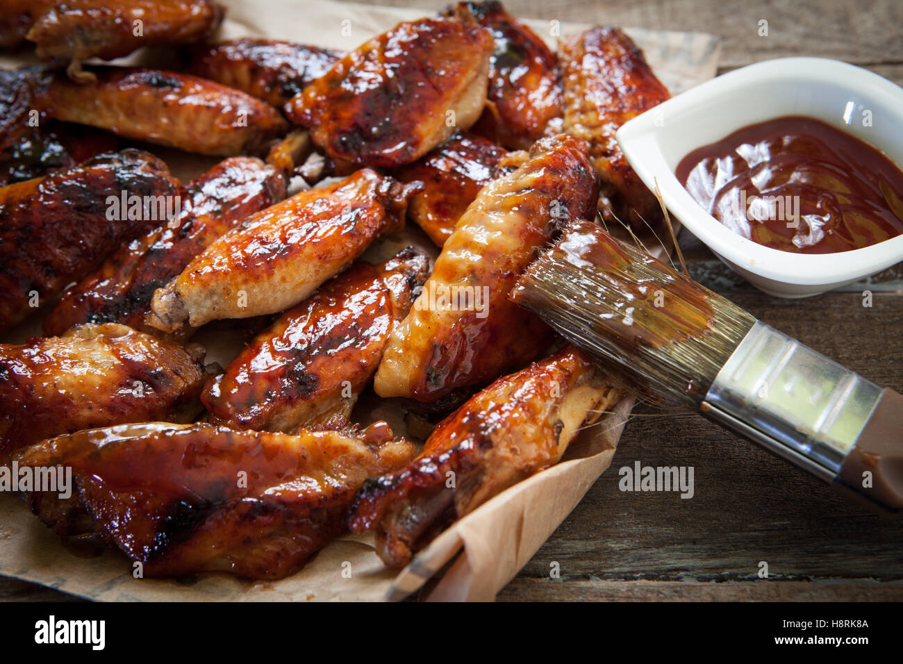 Hot bbq chicken wings on oven tray Stock Photo - Alamy
