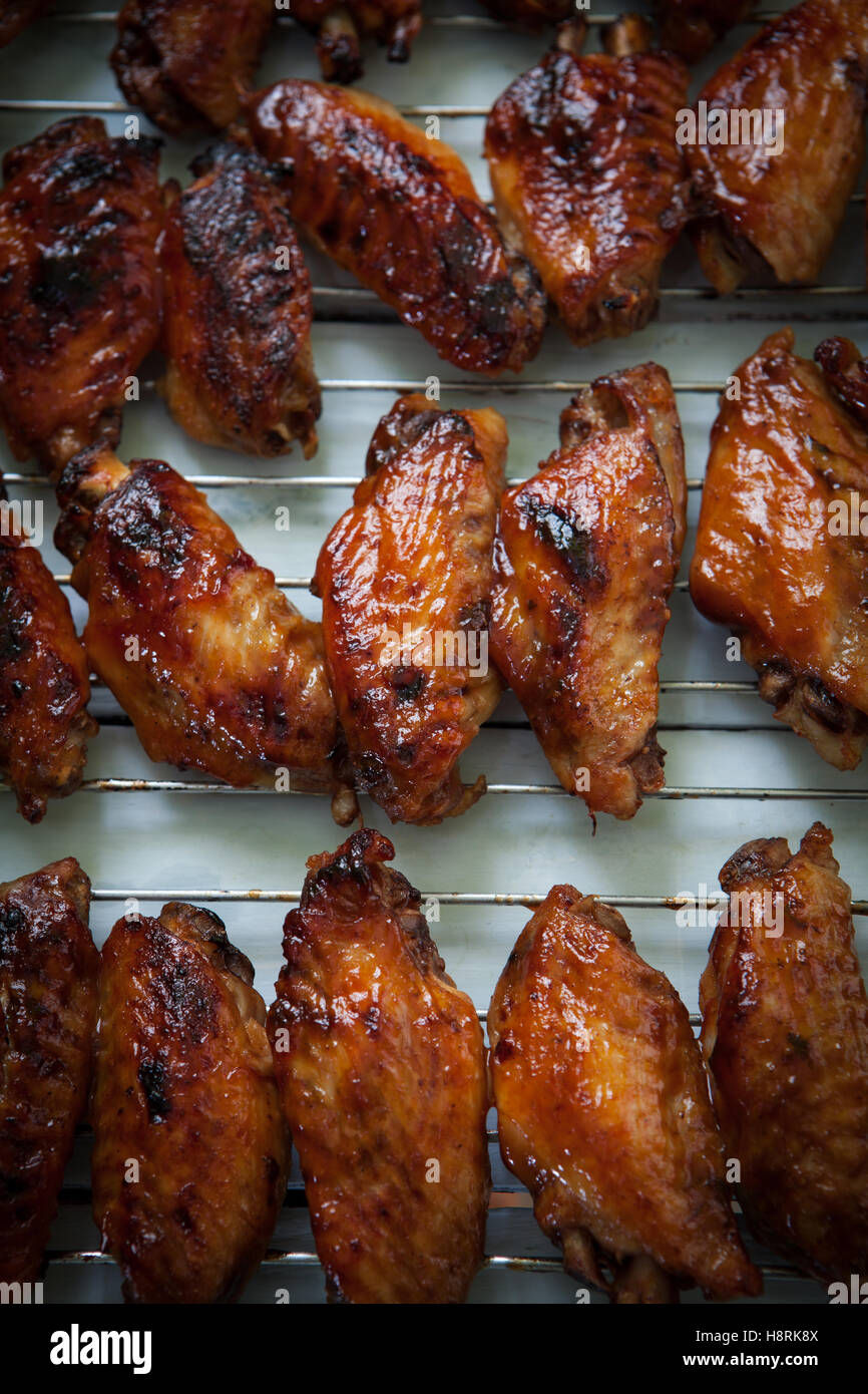 Hot bbq chicken wings on oven tray Stock Photo - Alamy
