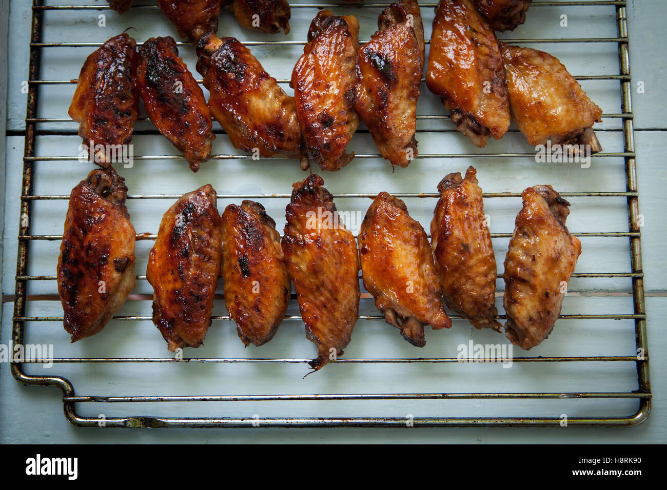 Hot bbq chicken wings on oven tray Stock Photo - Alamy