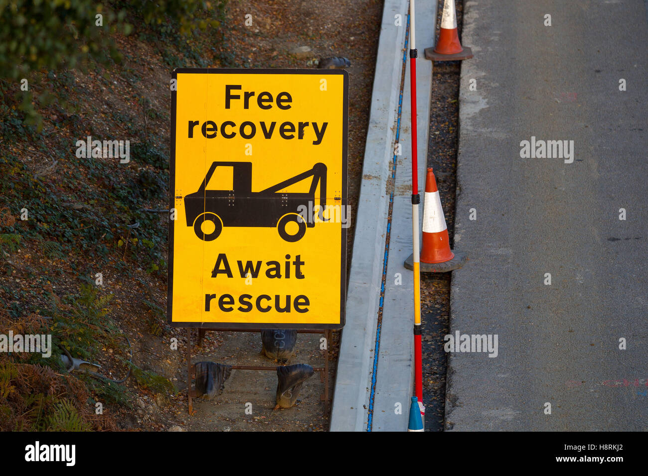 Free recovery await rescue roadworks sign on the M3 in Surrey, England ...