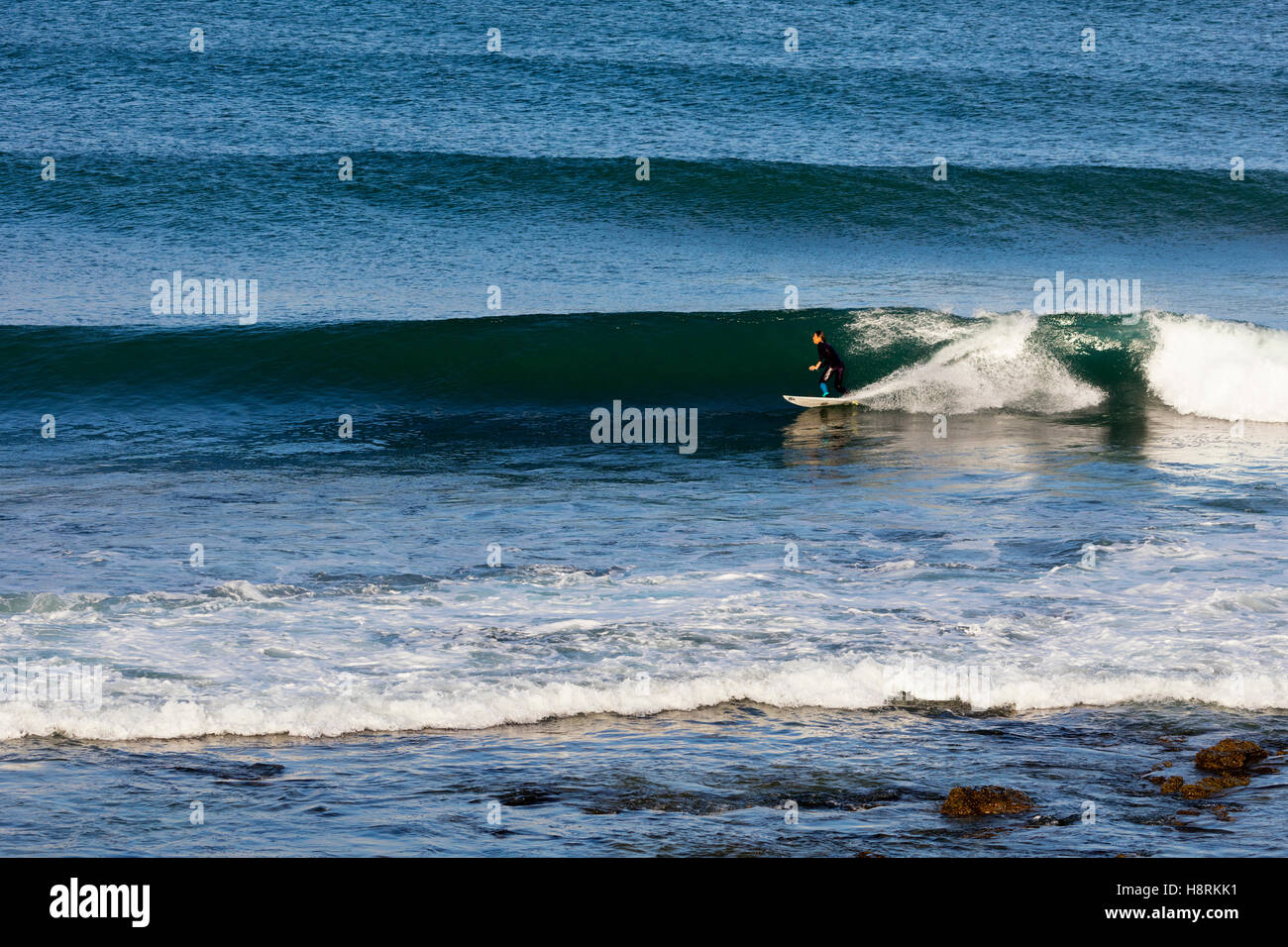 South Africa, Eastern Cape, Jeffery's Bay, surfer at Supertubes wave ...