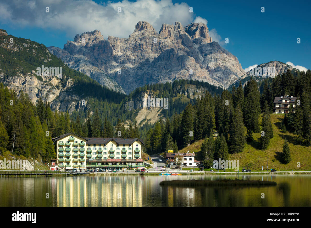 Reflections of the Grand Hotel Misurina in Lago Misurina with the ...