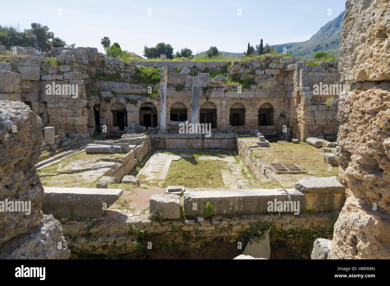 The Roman fountain at Ancient Corinth, Greece, Europe Stock Photo - Alamy