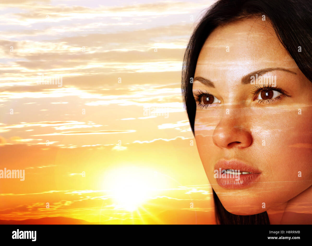 woman's face on a sunset close up Stock Photo - Alamy