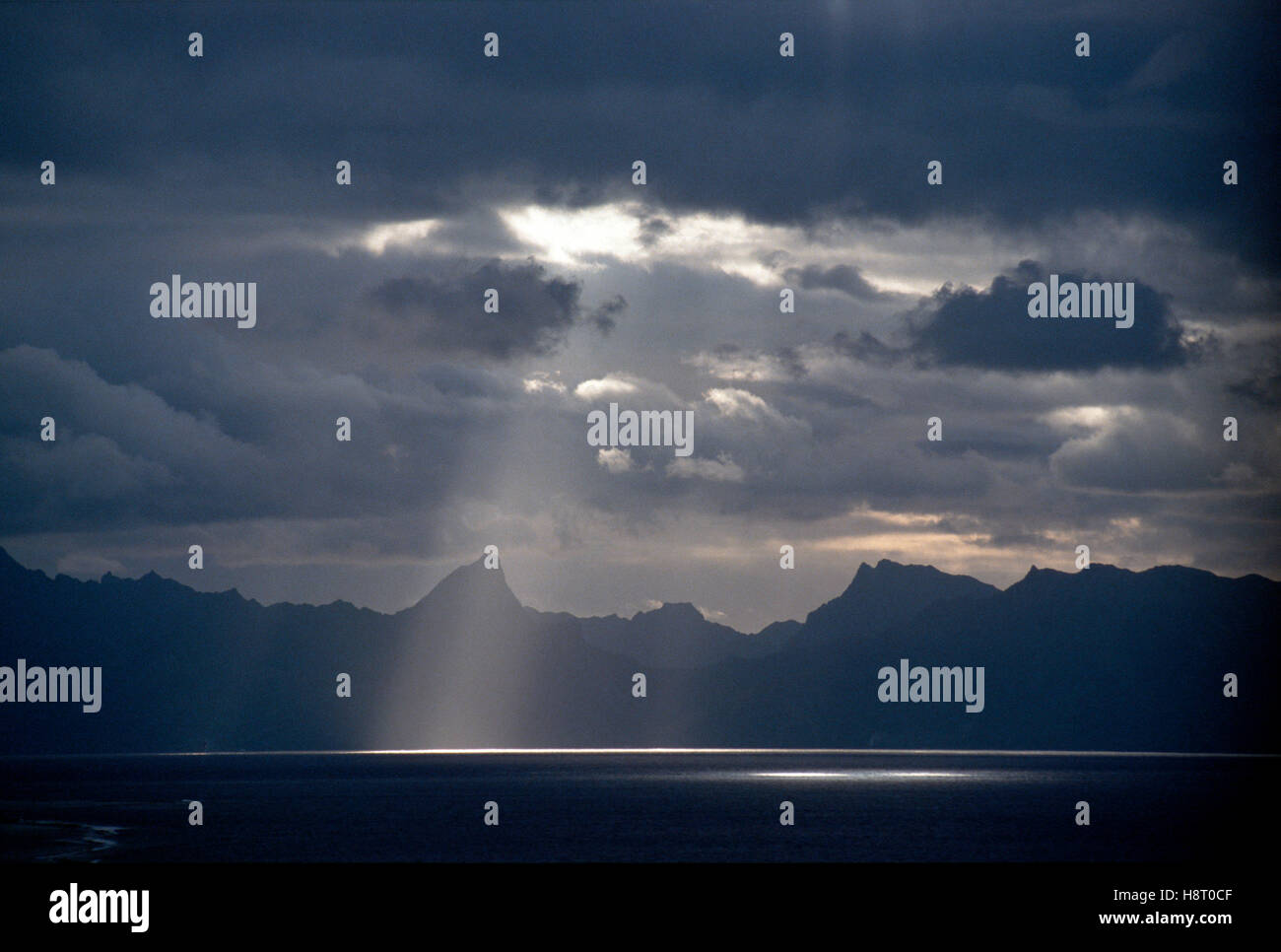 French Polynesia, sun ray over Moorea island Stock Photo - Alamy