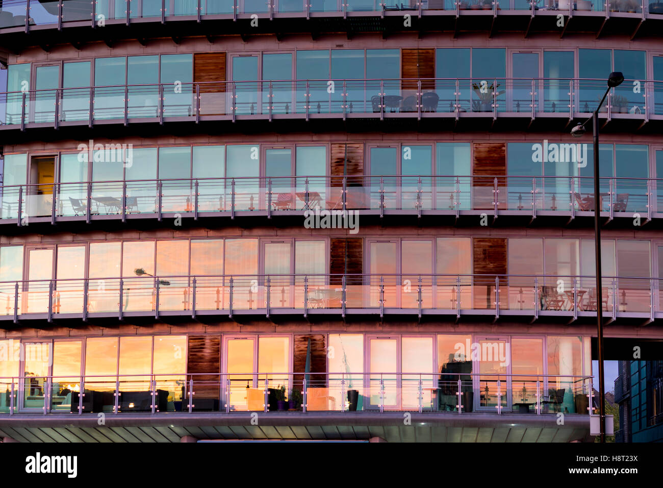 Apartments verandah sunset Stock Photo - Alamy