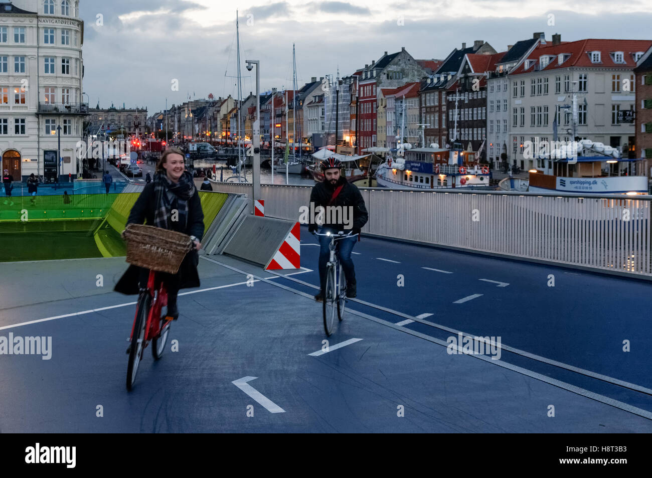 Cyclists on the Inderhavnsbroen (The Inner Harbour Bridge) pedestrian ...