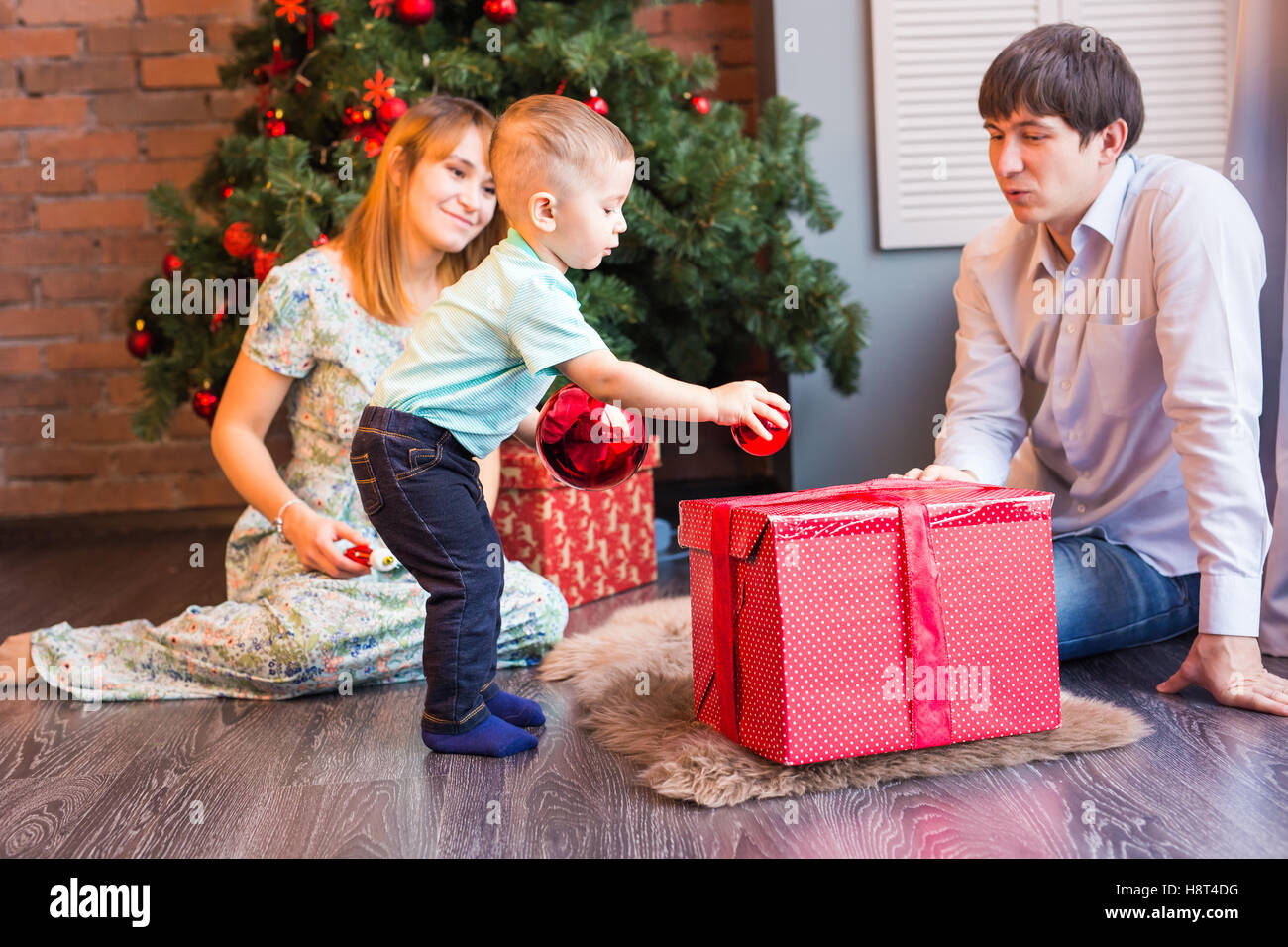 Child happy receive christmas gift hi-res stock photography and images ...