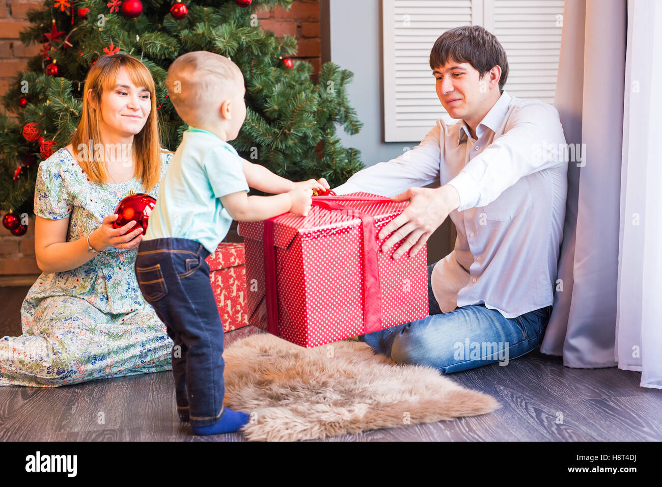 Child happy receive christmas gift hi-res stock photography and images ...