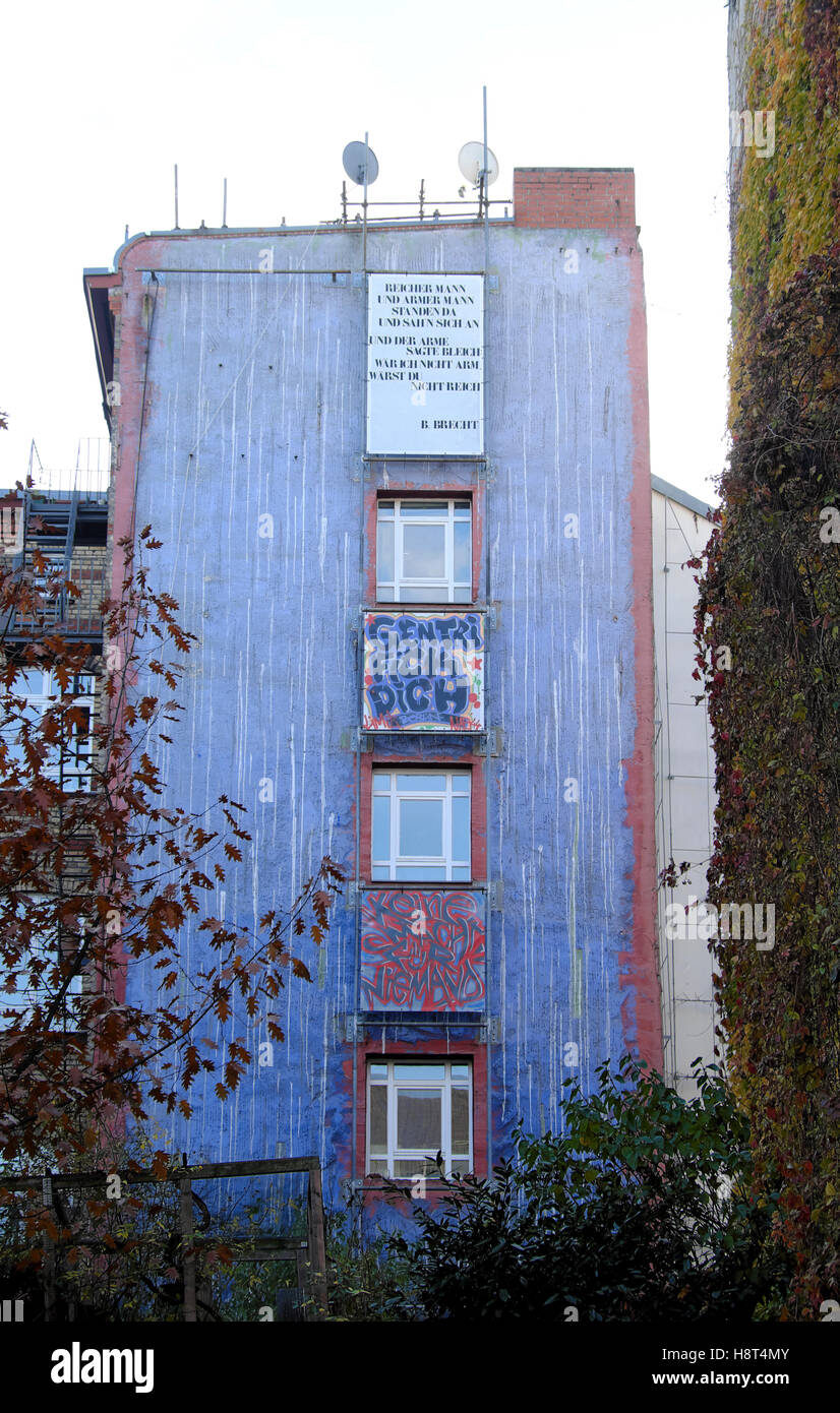 Blue house with Gentrifickdich Gentrification artwork in Berlin ...