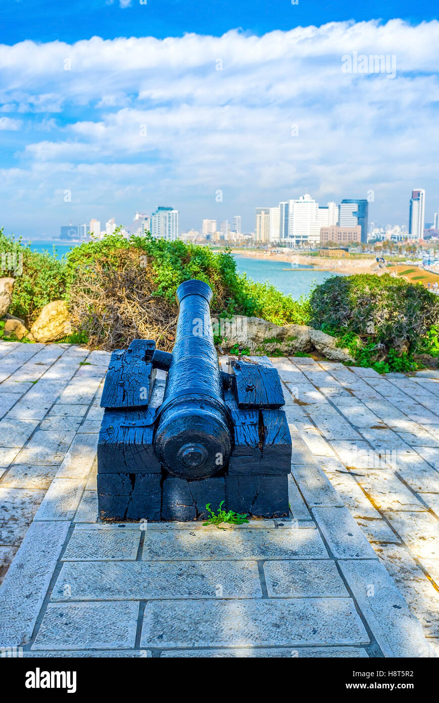 The old black cannon on the Jaffa hill, with the modern Tel Aviv ...