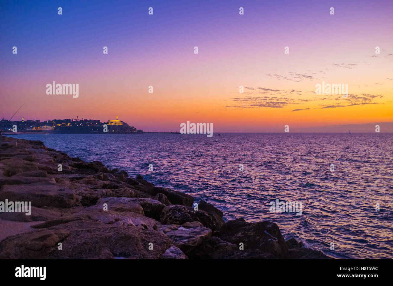 The unique colors of the sea coast during the twilight with old Jaffa ...