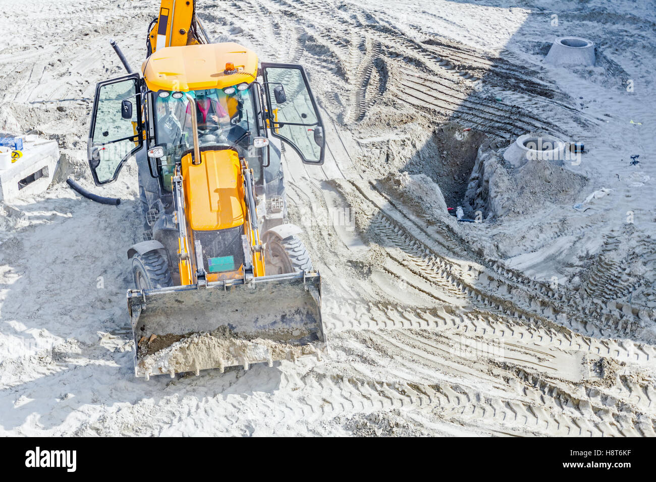 Above view on excavator is moving ground at construction site Stock ...