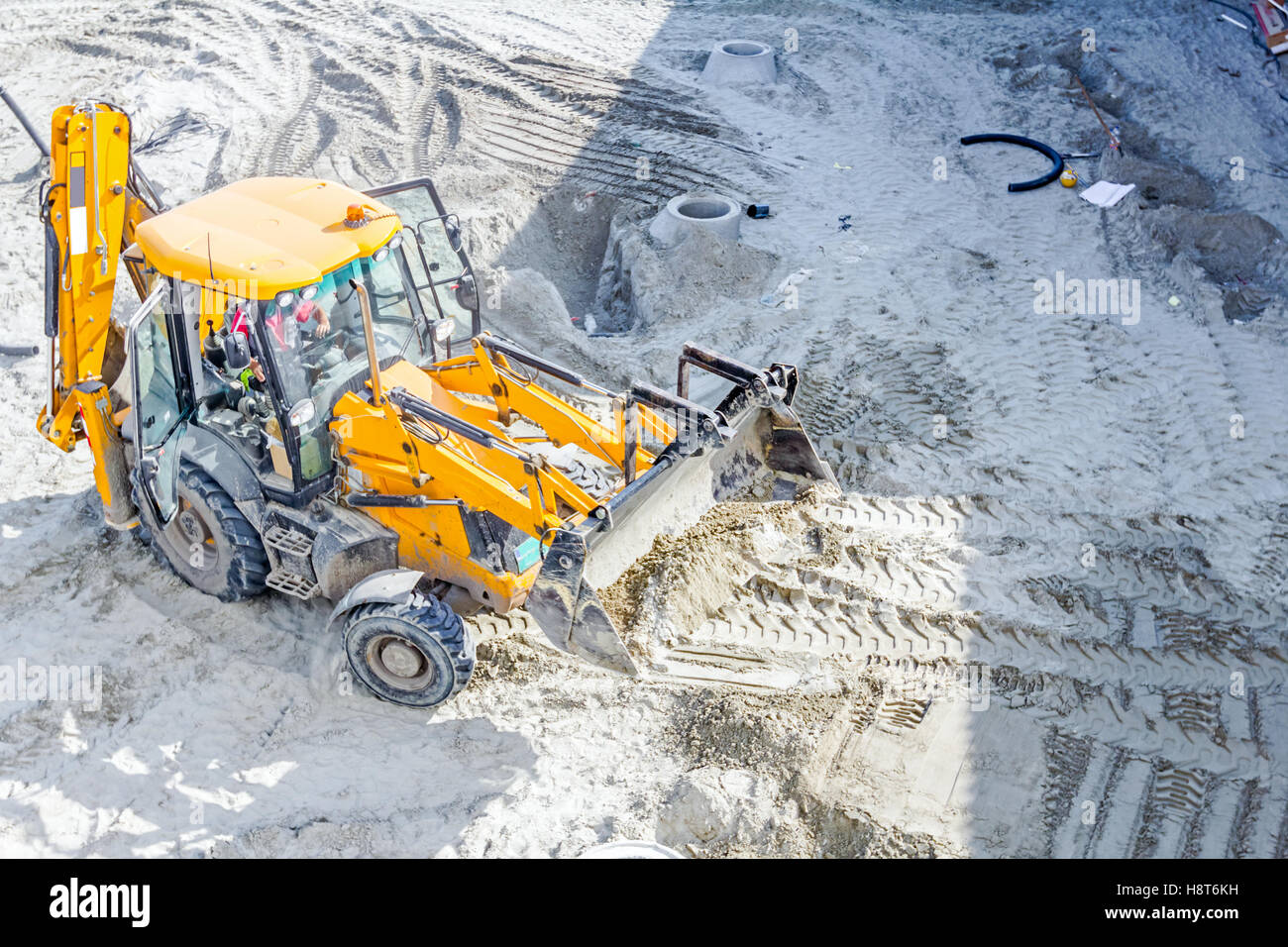 Above view on excavator is moving ground at construction site Stock ...