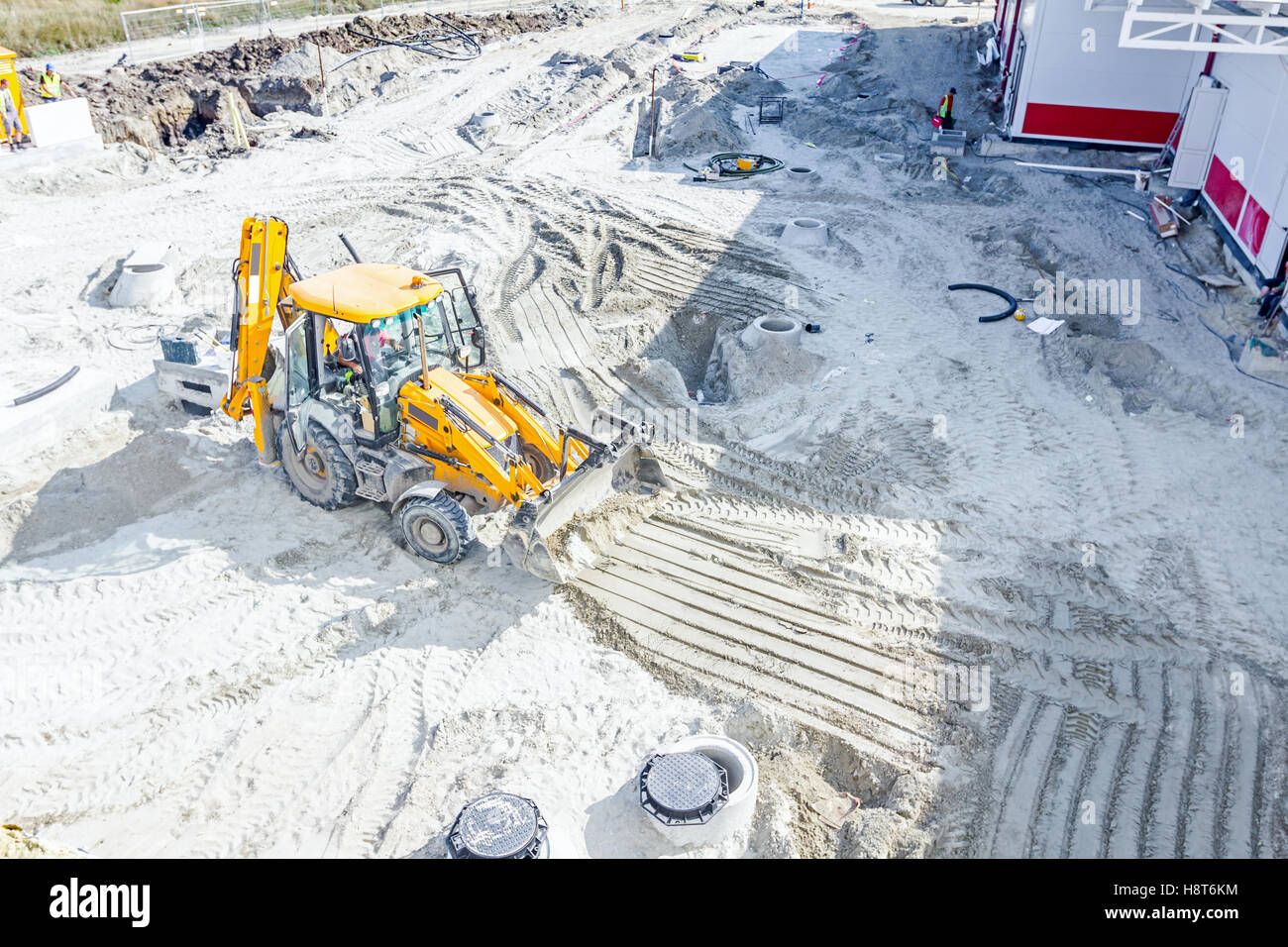 Above view on excavator is moving ground at construction site Stock ...