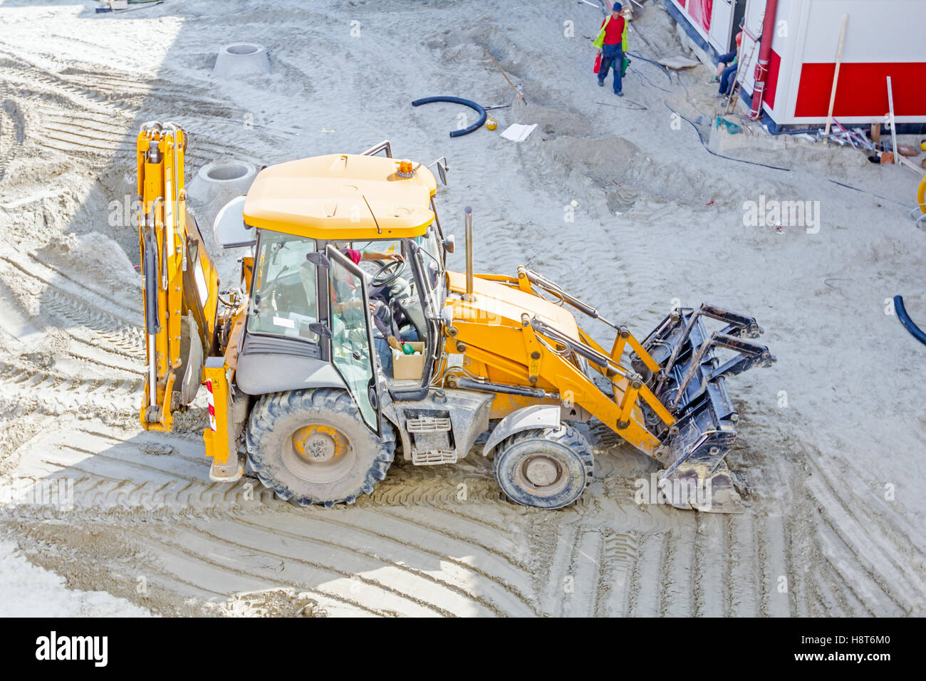 Above view on excavator is moving ground at construction site Stock ...